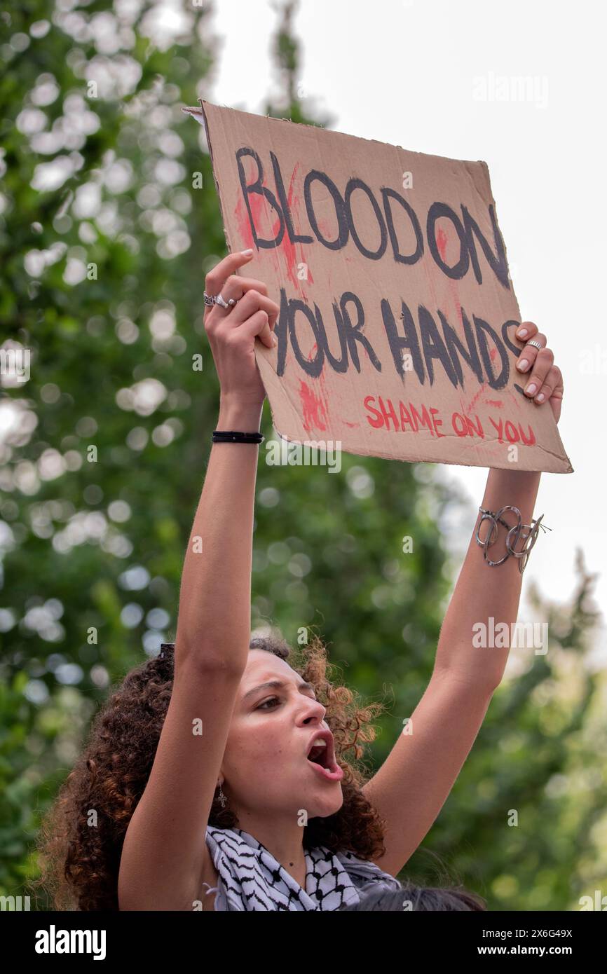 Woman Holding Billboard Blood On Your Hands At The Student ...
