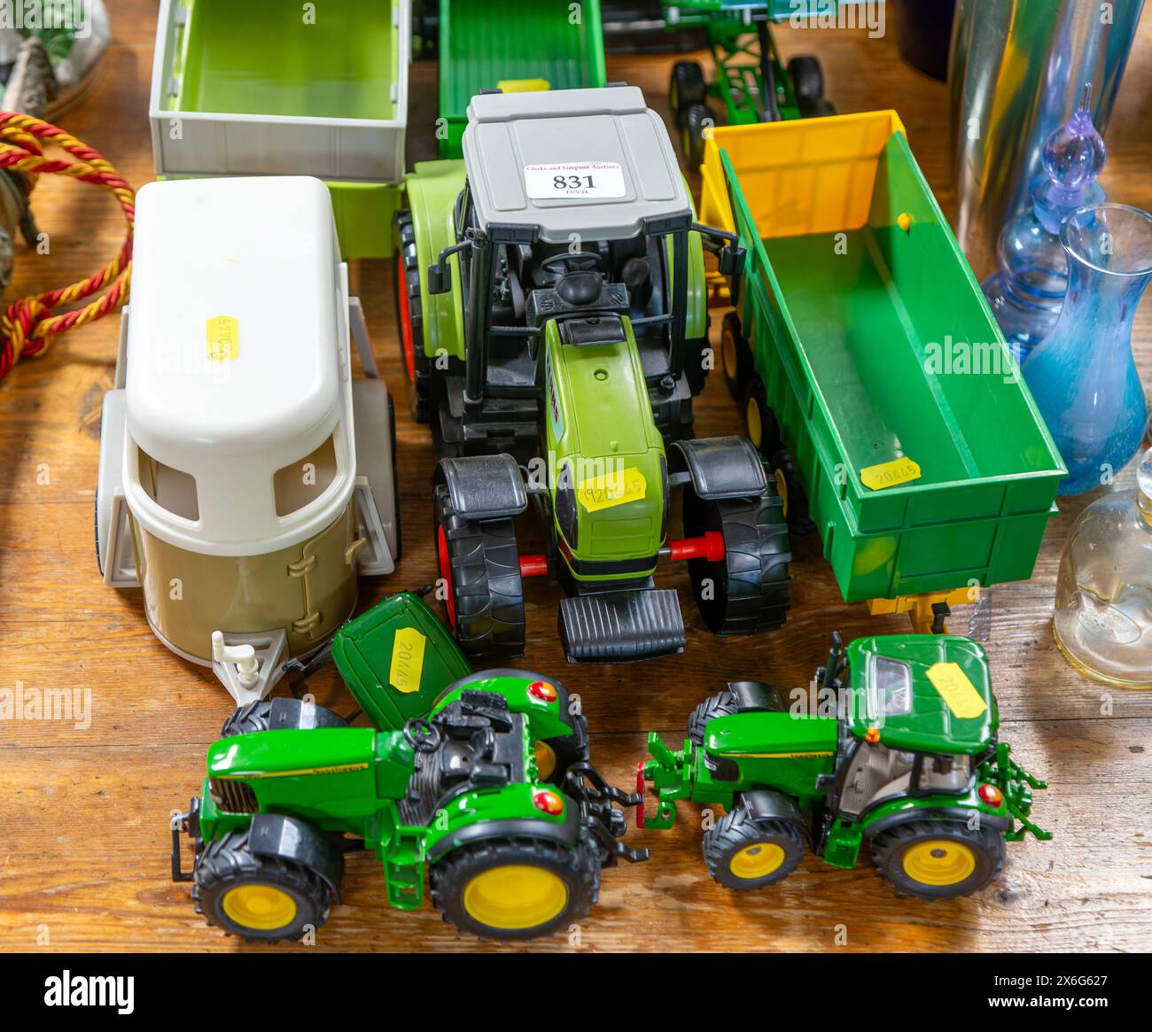 Plastic toy models of tractors and farm machinery on sale at auction ...