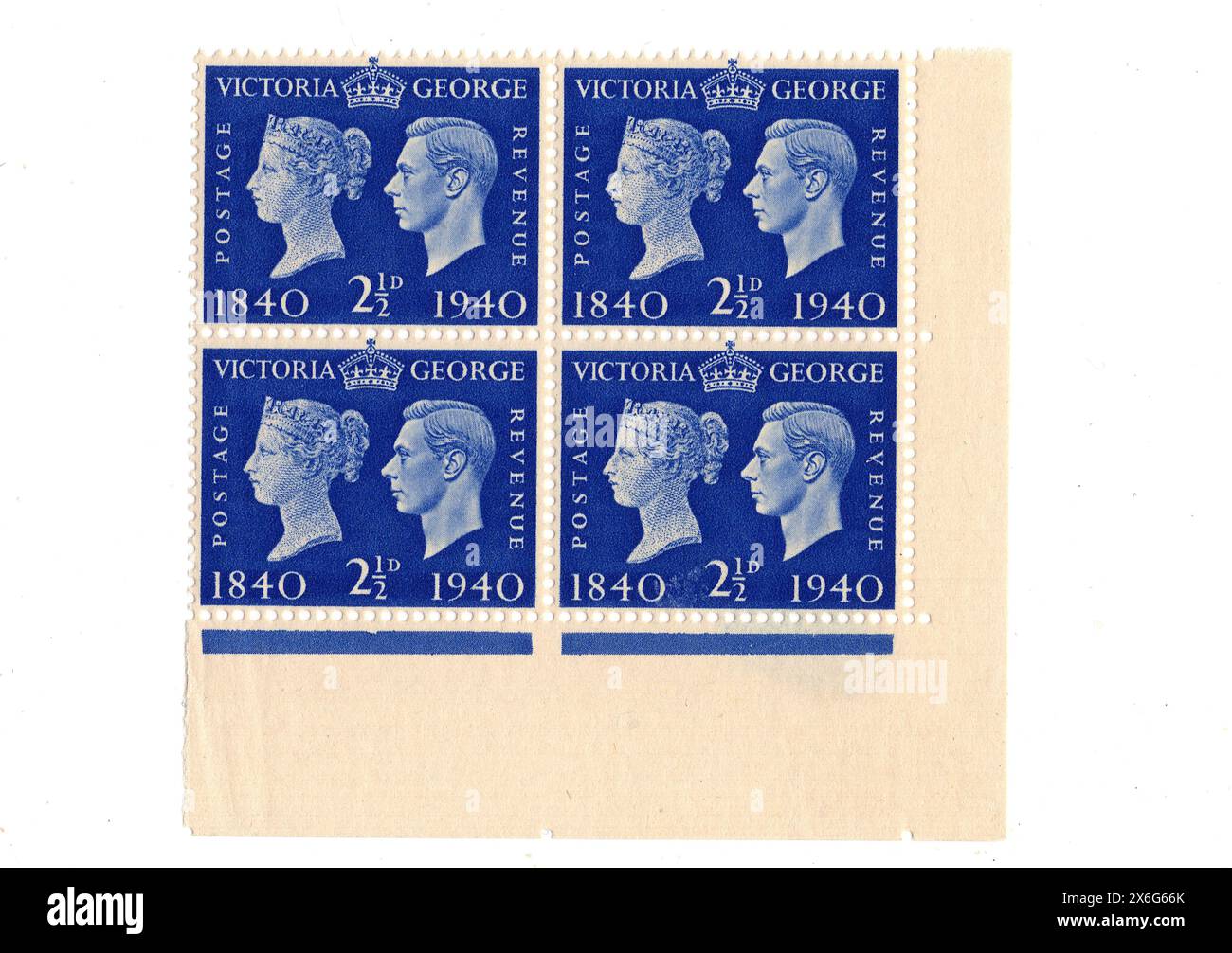 A block of Queen Victoria and King George VI postage stamps from Great ...