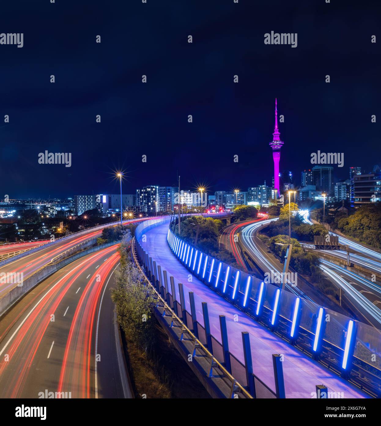 Sky Tower Lit Up In Pink To Celebrate Mothers Day Long Exposure Image With Car Light Trails On