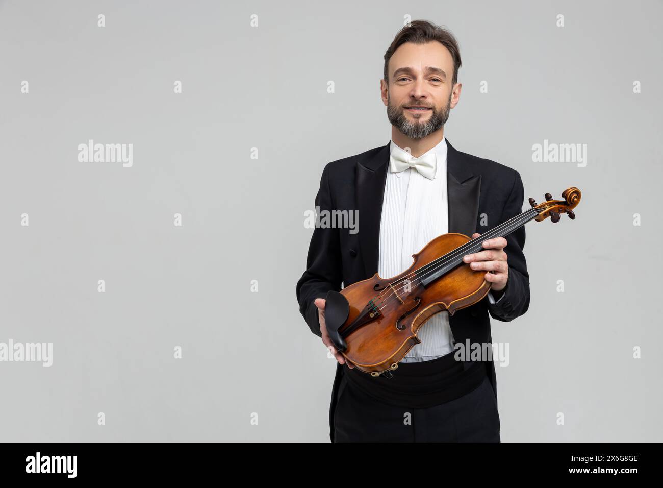 Bearded musician performed violin at classical music concert Stock ...