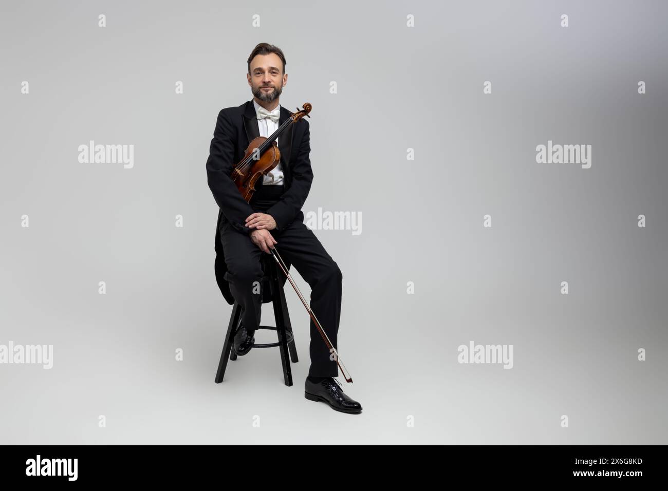 Bearded violinist with instrument classical music at concert Stock ...