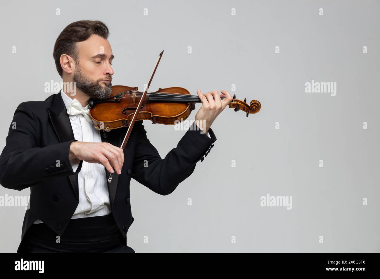 Bearded musician performed violin at classical music concert Stock ...