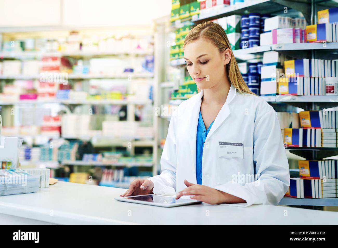 Pharmacy, woman or pharmacist with digital tablet to order medication ...