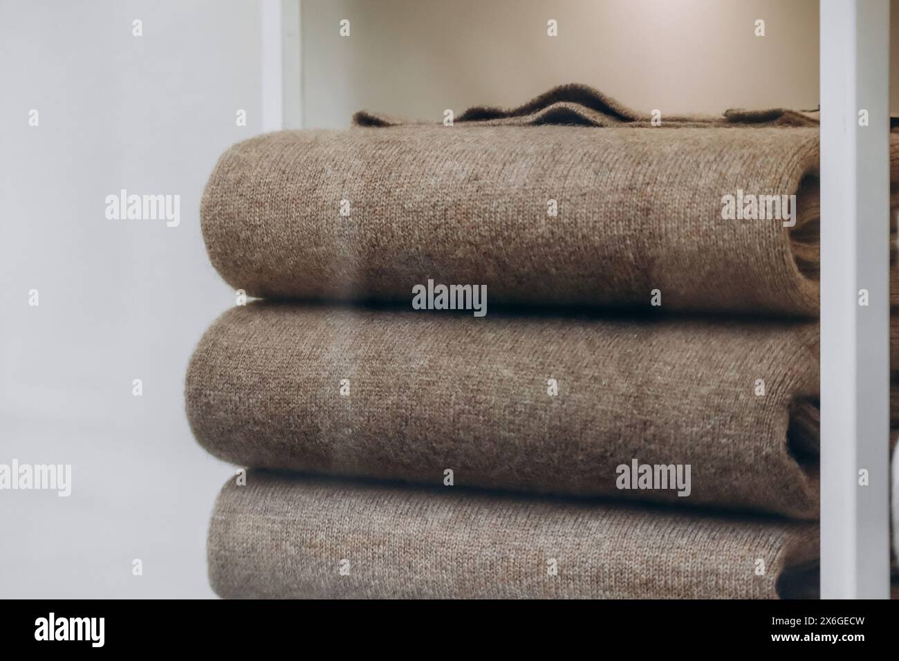 Sweaters in pile hi-res stock photography and images - Alamy