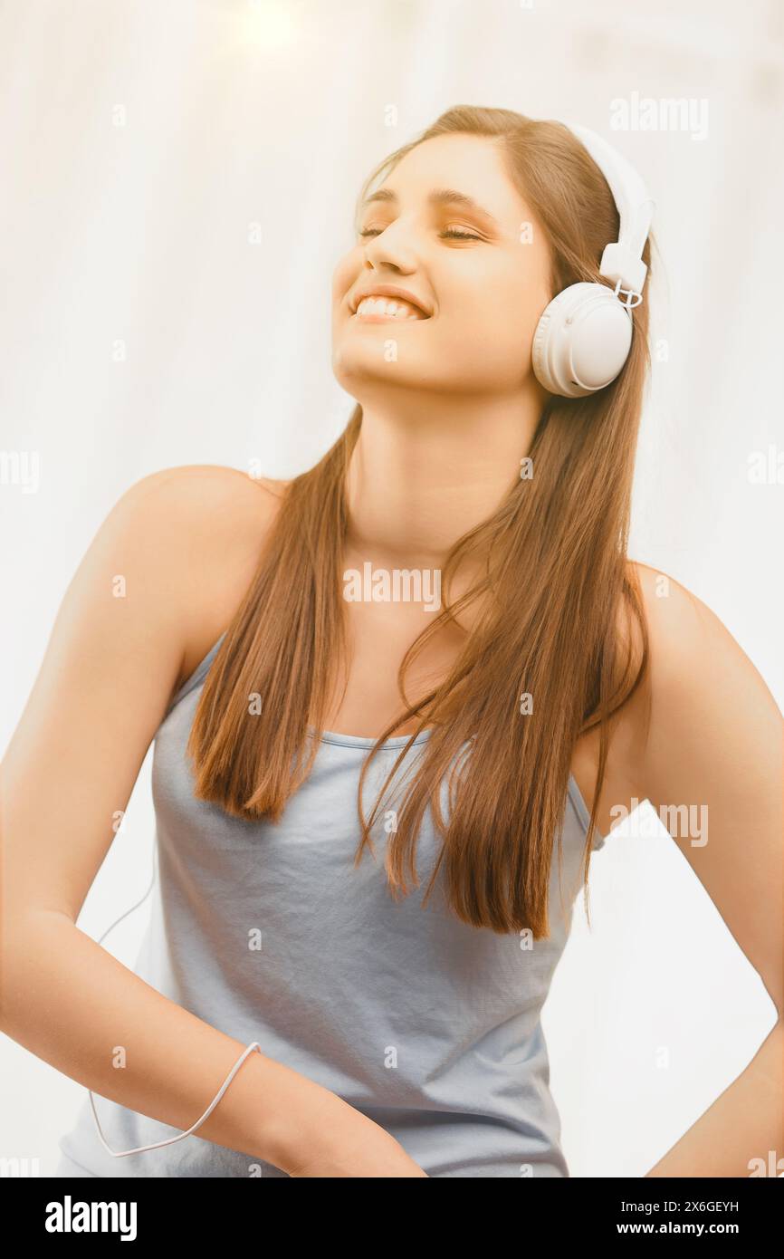 The warmth of the sun and sweet sounds fill this young woman with a ...