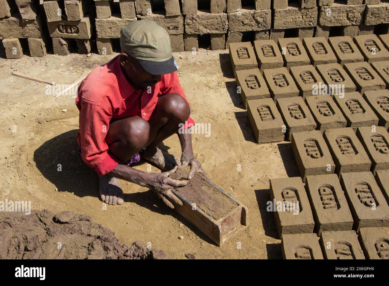 May 15, 2024, Budgam, Jammu And Kashmir, India: A worker labors to make ...
