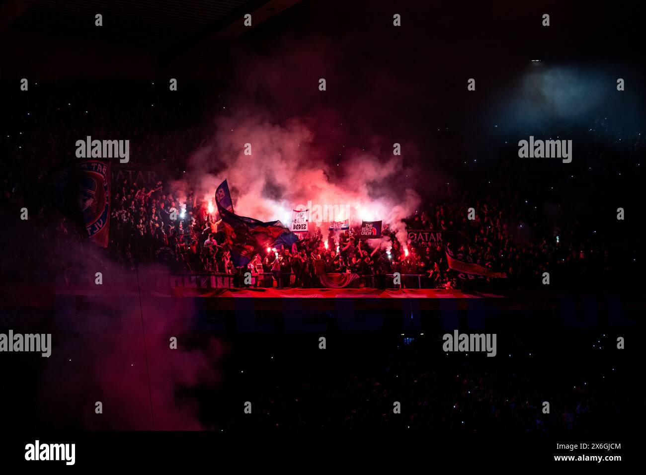 PARIS, FRANCE - MAY 12: PSG ultras fans set up flares after winning the ...