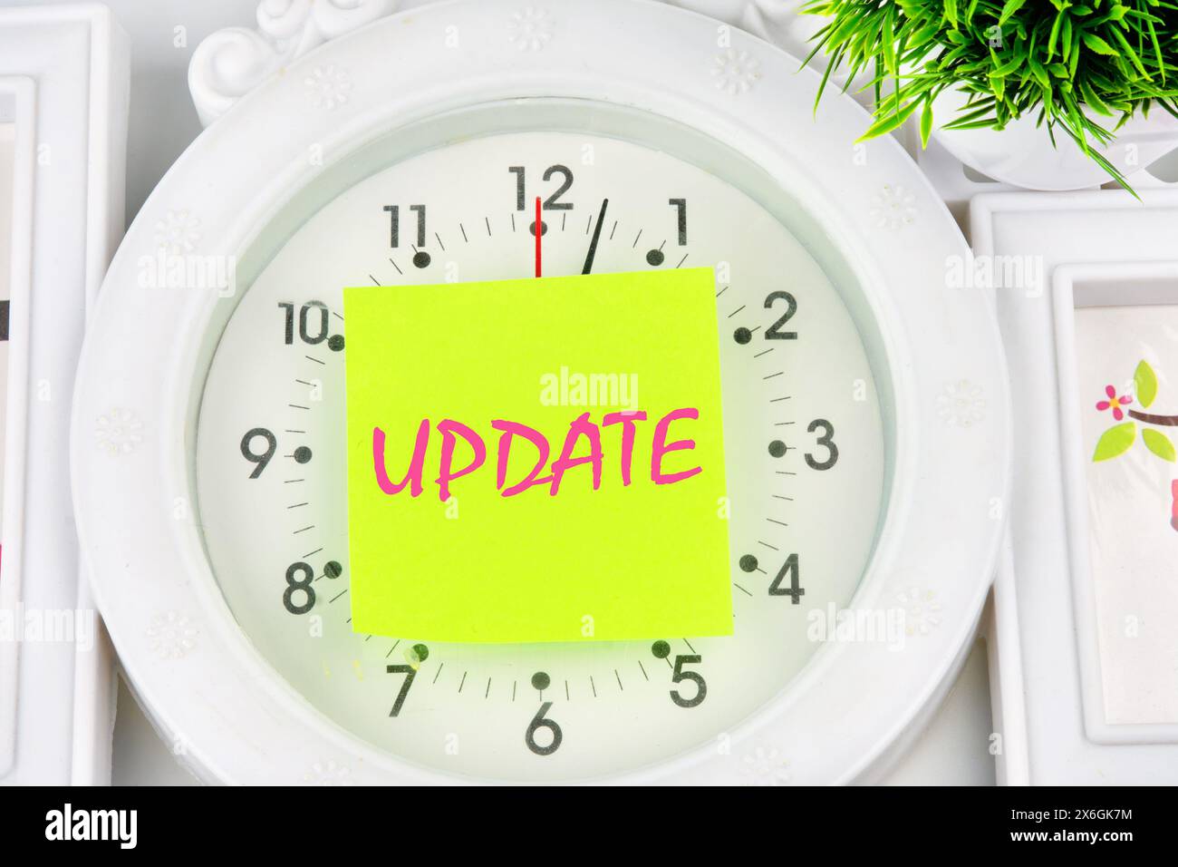 The word UPDATE the inscription on the sticker glued to the watch Stock ...