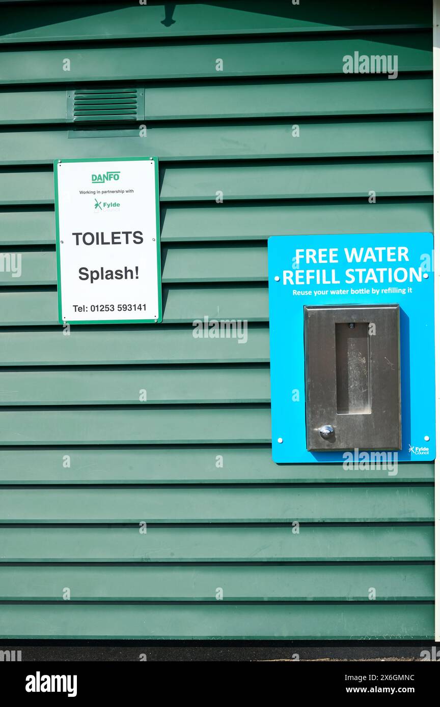 Free water refill station on public building wall Stock Photo - Alamy