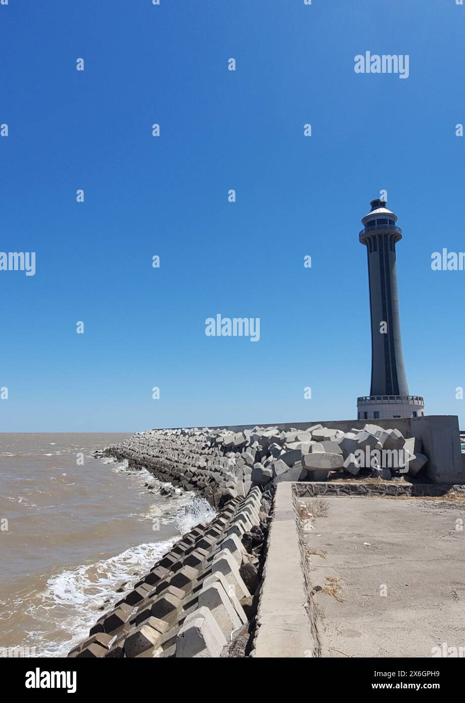 The Guangli Port Lighthouse standing tall on the coast of the Bohai Sea ...