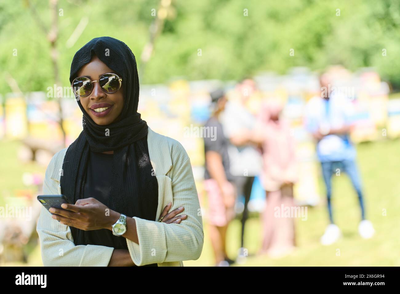 Empowered Middle Eastern Muslim Woman in Hijab Balances Modern ...