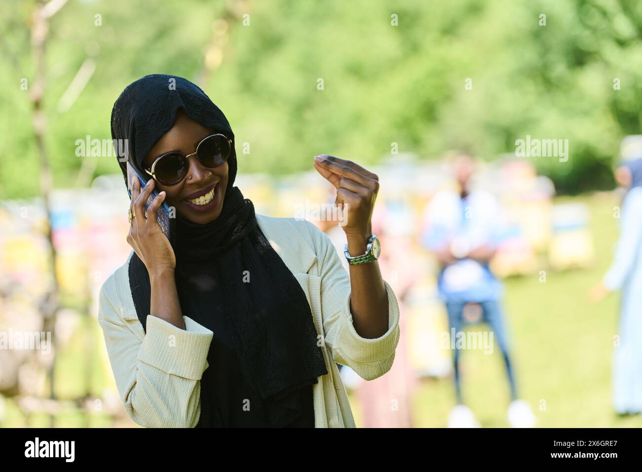 Empowered Middle Eastern Muslim Woman in Hijab Balances Modern ...