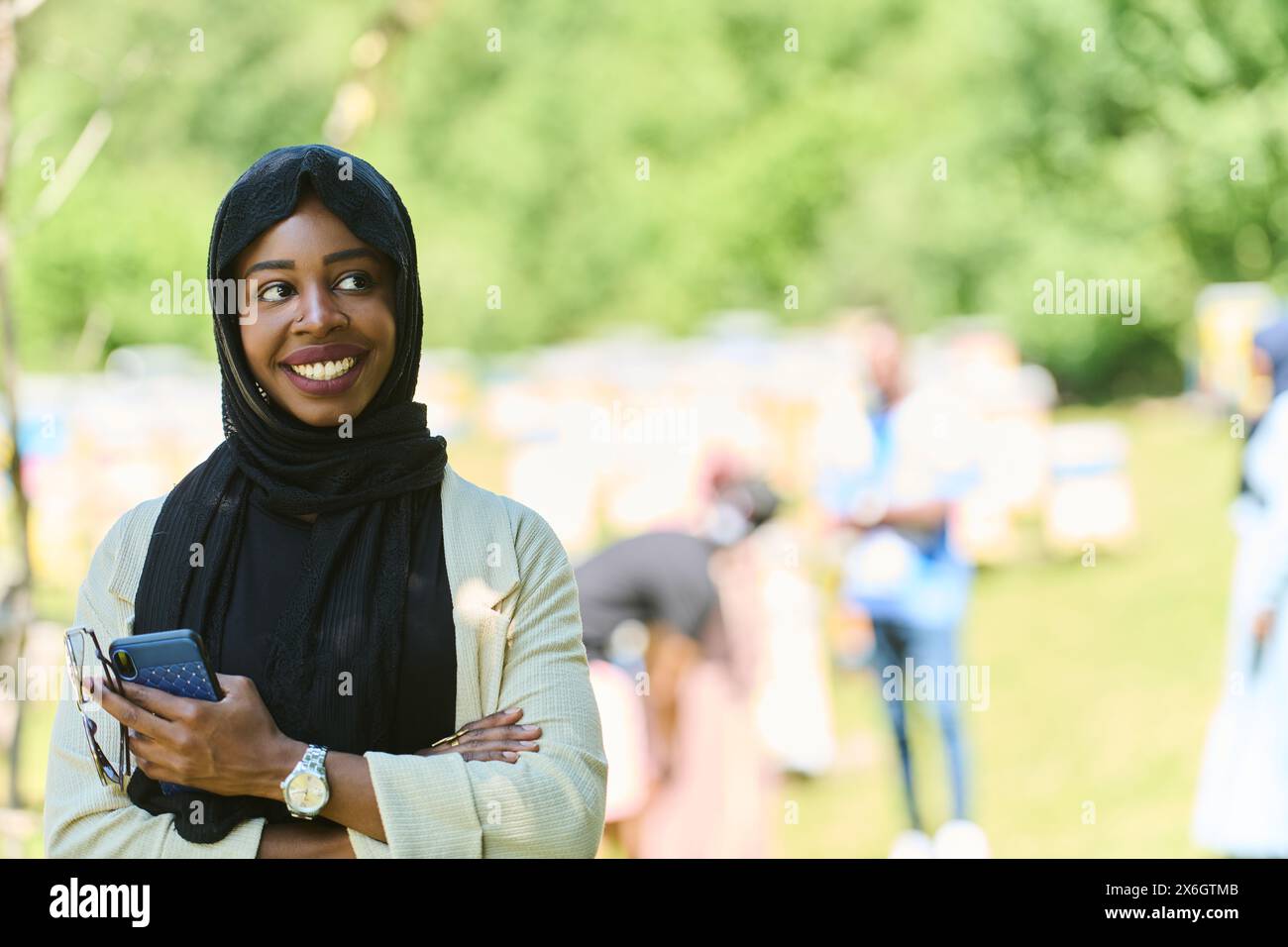Empowered Middle Eastern Muslim Woman in Hijab Balances Modern ...