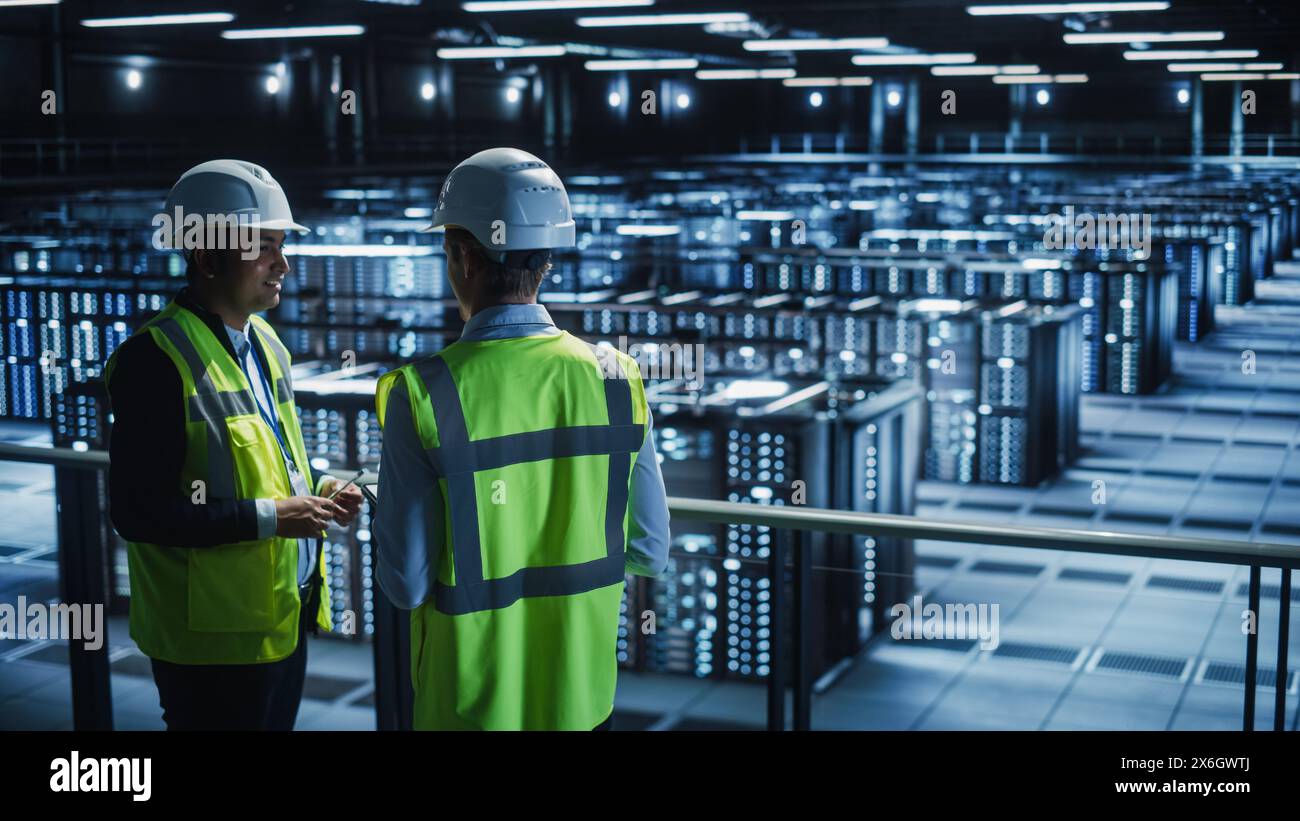 Two asian engineers checking system hi-res stock photography and images ...