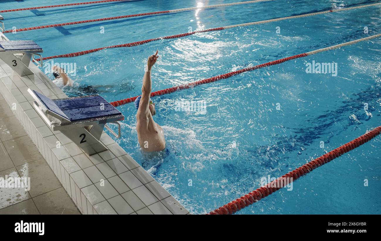 Successful Male Swimmer Celebrates New World Record and Championship ...