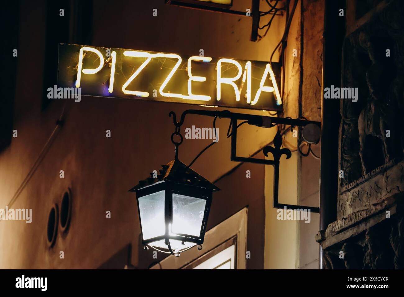 Neon sign of a pizzeria in Florence, Italy Stock Photo - Alamy
