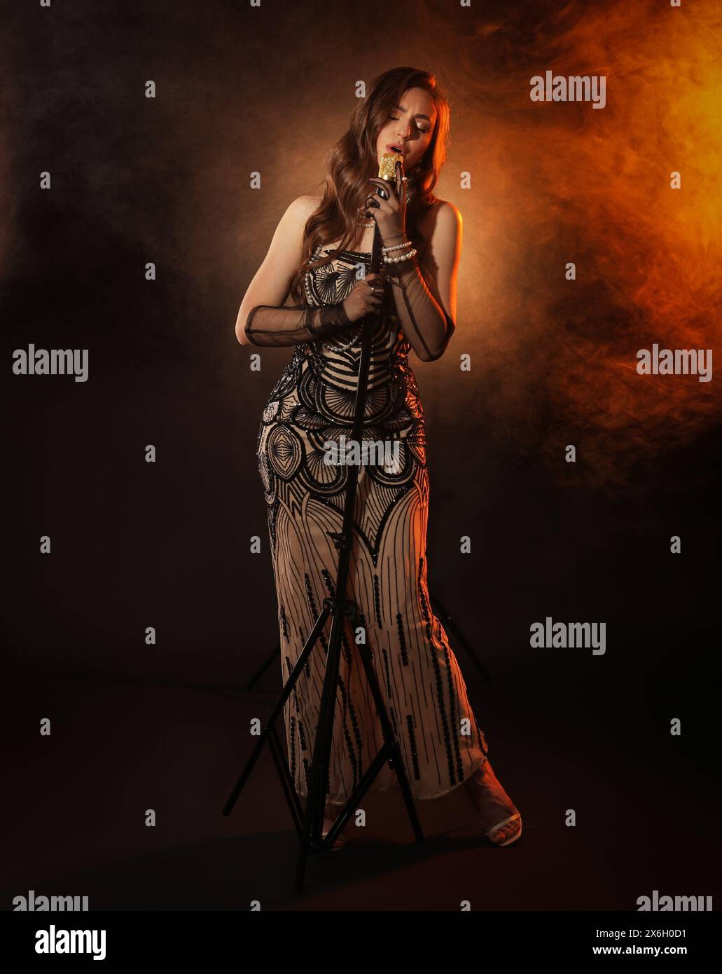 Beautiful woman singing microphone hi-res stock photography and images ...