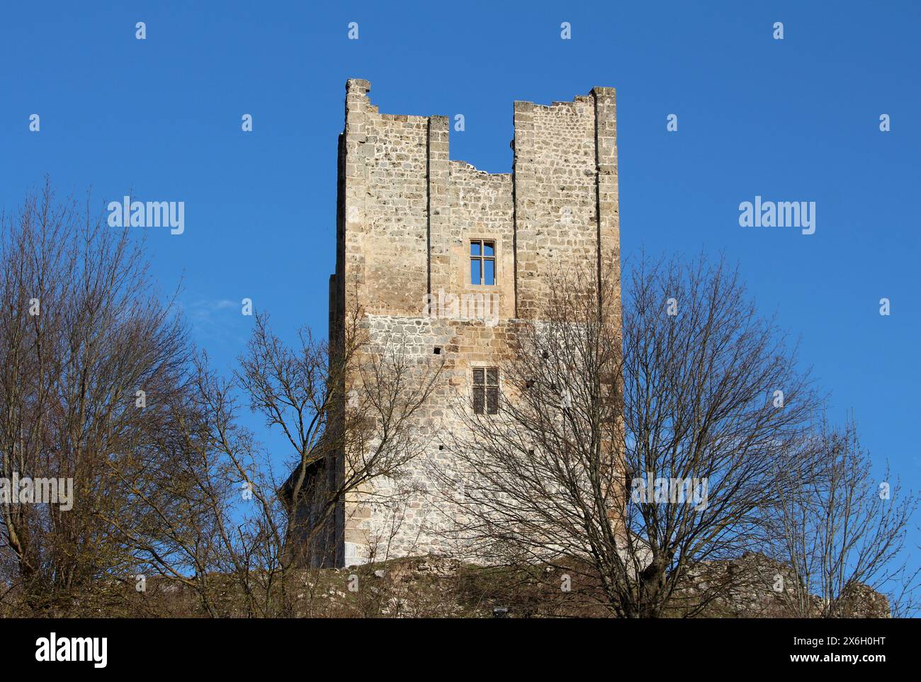 Ruins of abandoned old stone medieval town castle guard tower with ...