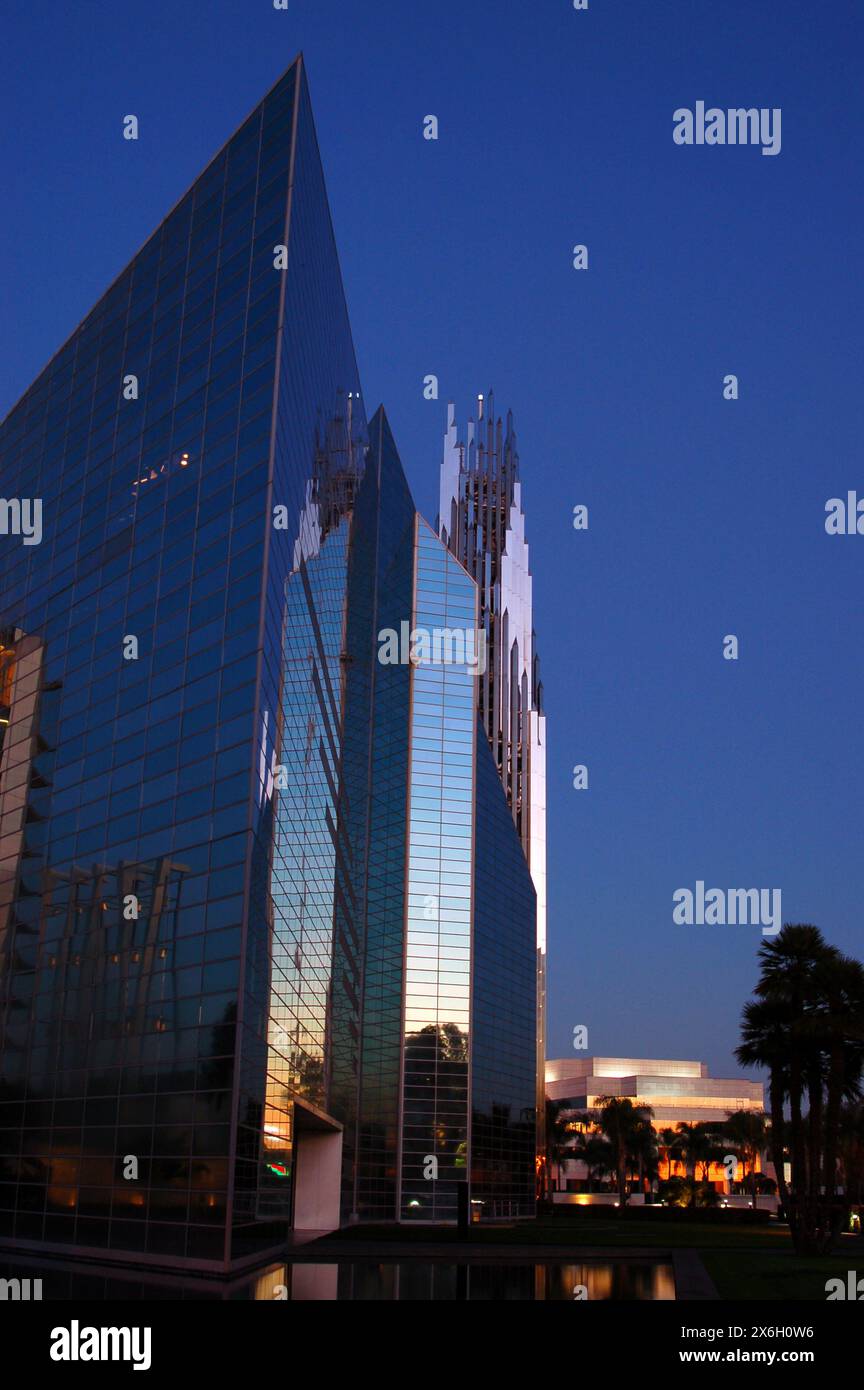 The sunset is reflected in the exterior glass wall of the Christ ...