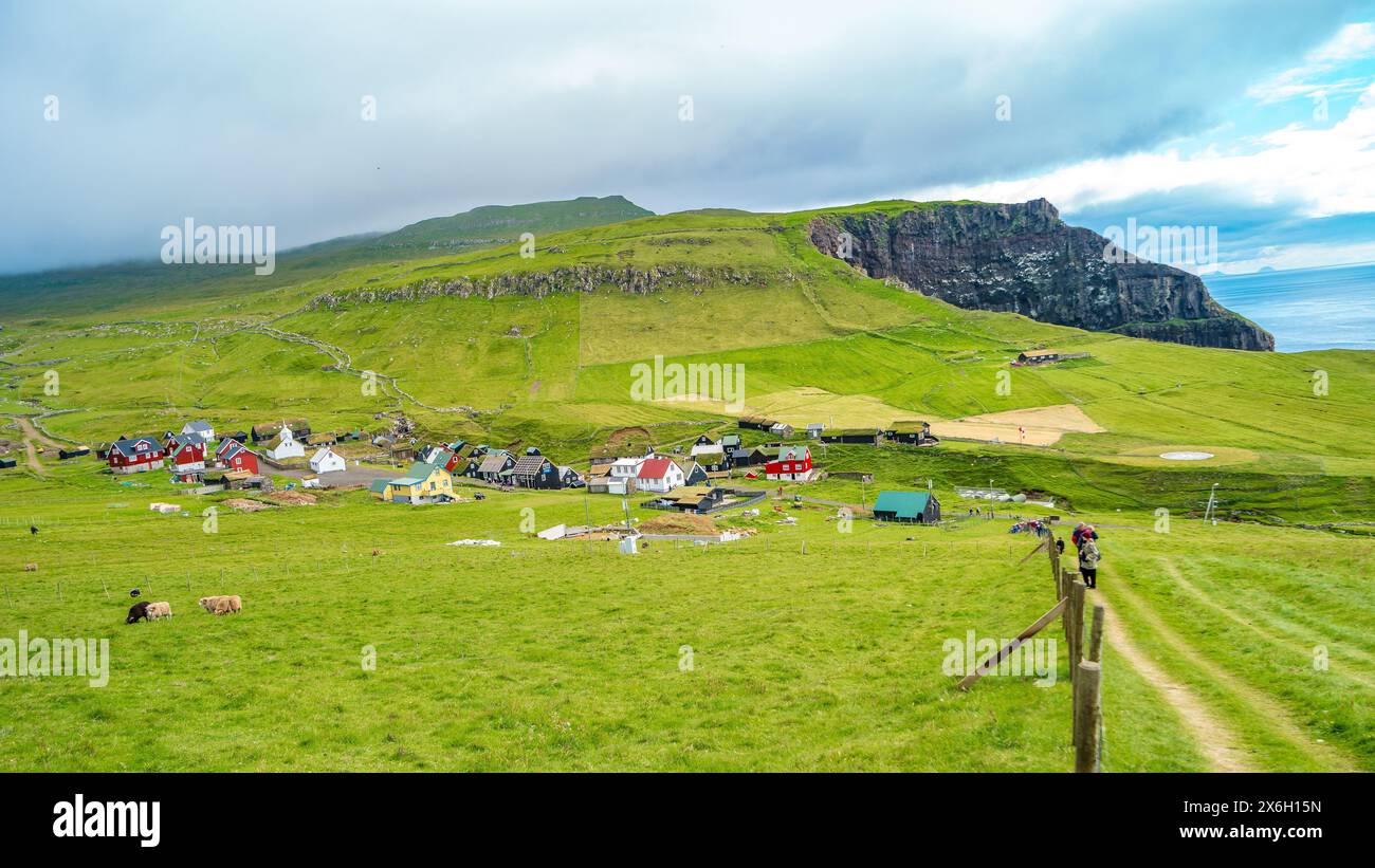 Mykines, Faroe Islands. Panoramic view of Mykines village with tourists ...