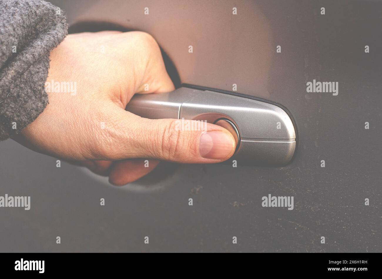 Hand on car handle hi-res stock photography and images - Alamy