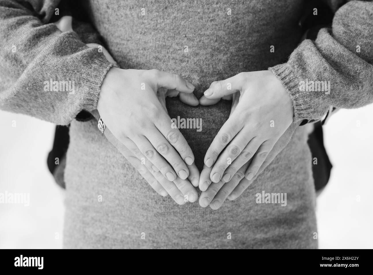 Hands family photo Black and White Stock Photos & Images - Alamy
