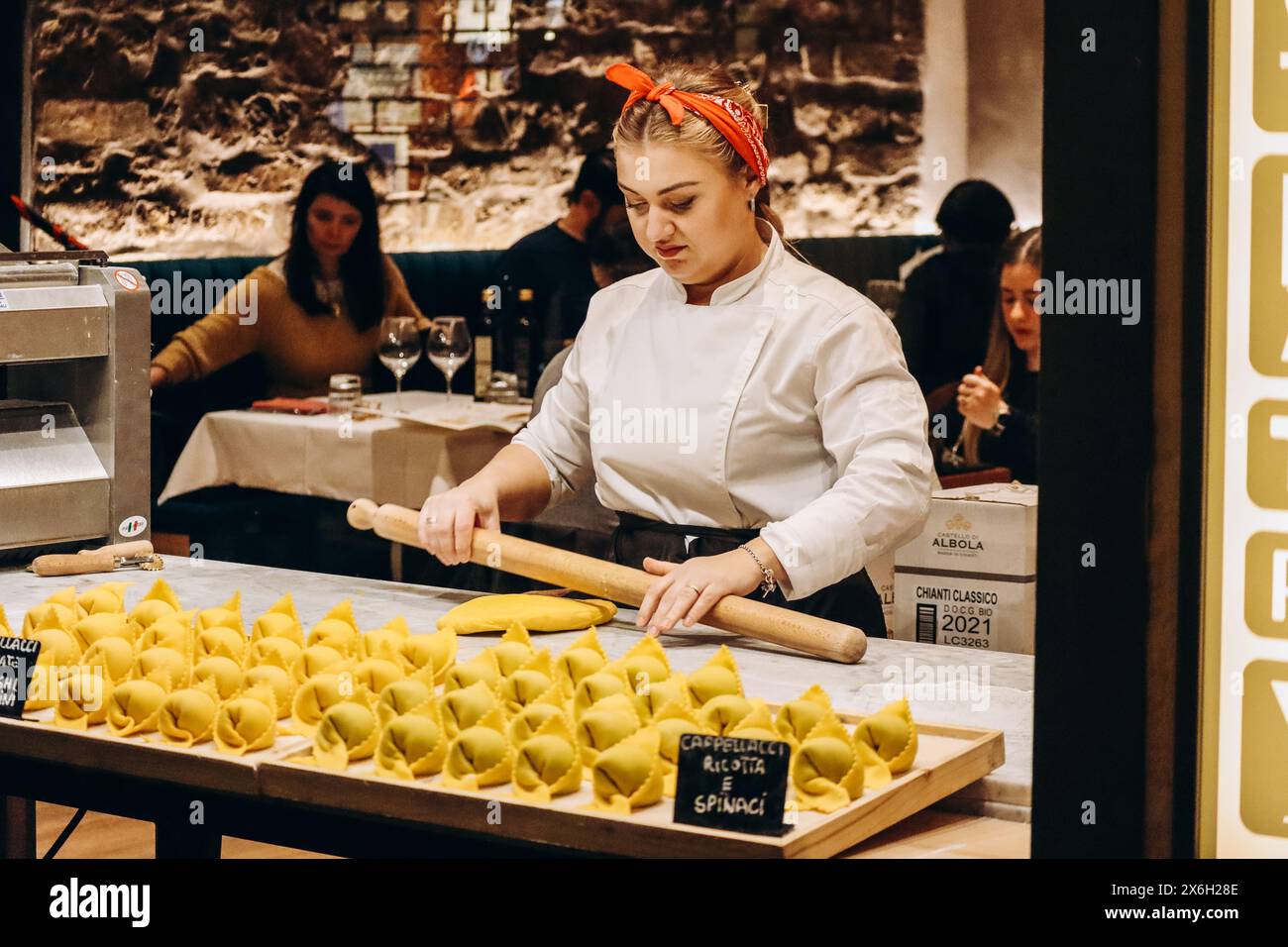 Florence, Italy - 29 December, 2023: The chef prepares the cappellacci ...