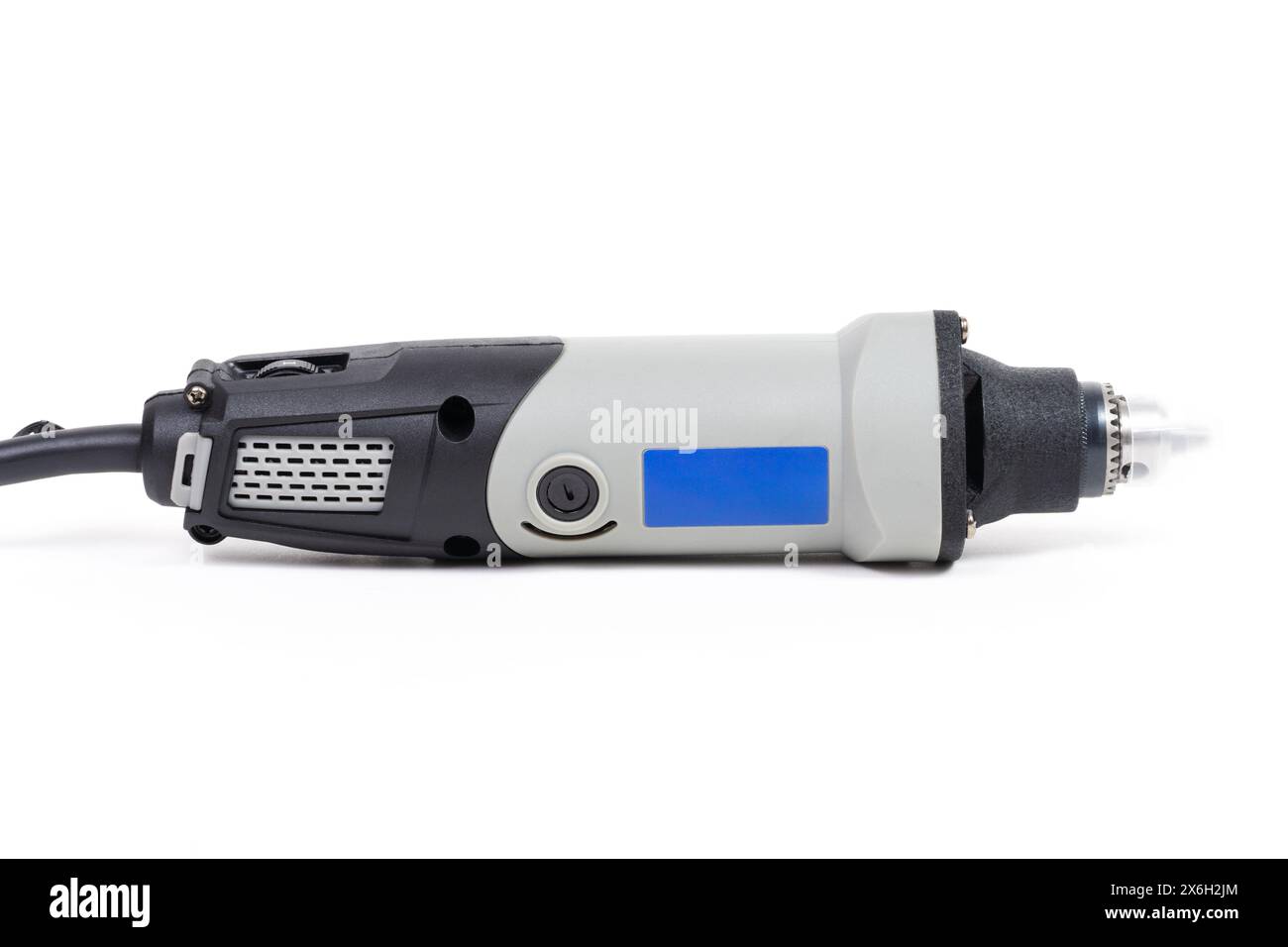 Close-up side view of a compact mini drill isolated on white background ...