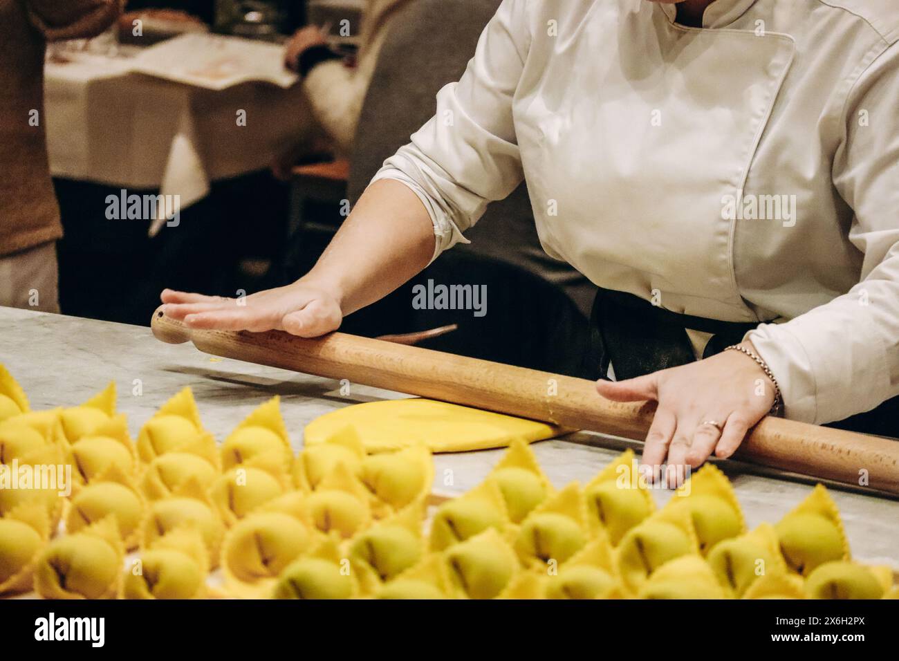 The chef prepares the cappellacci with ricotta and spinach Stock Photo ...