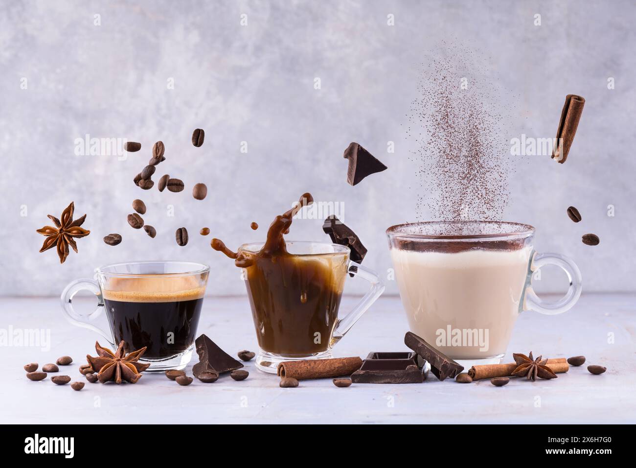 lively composition with espresso, latte and cappuccino in transparent ...