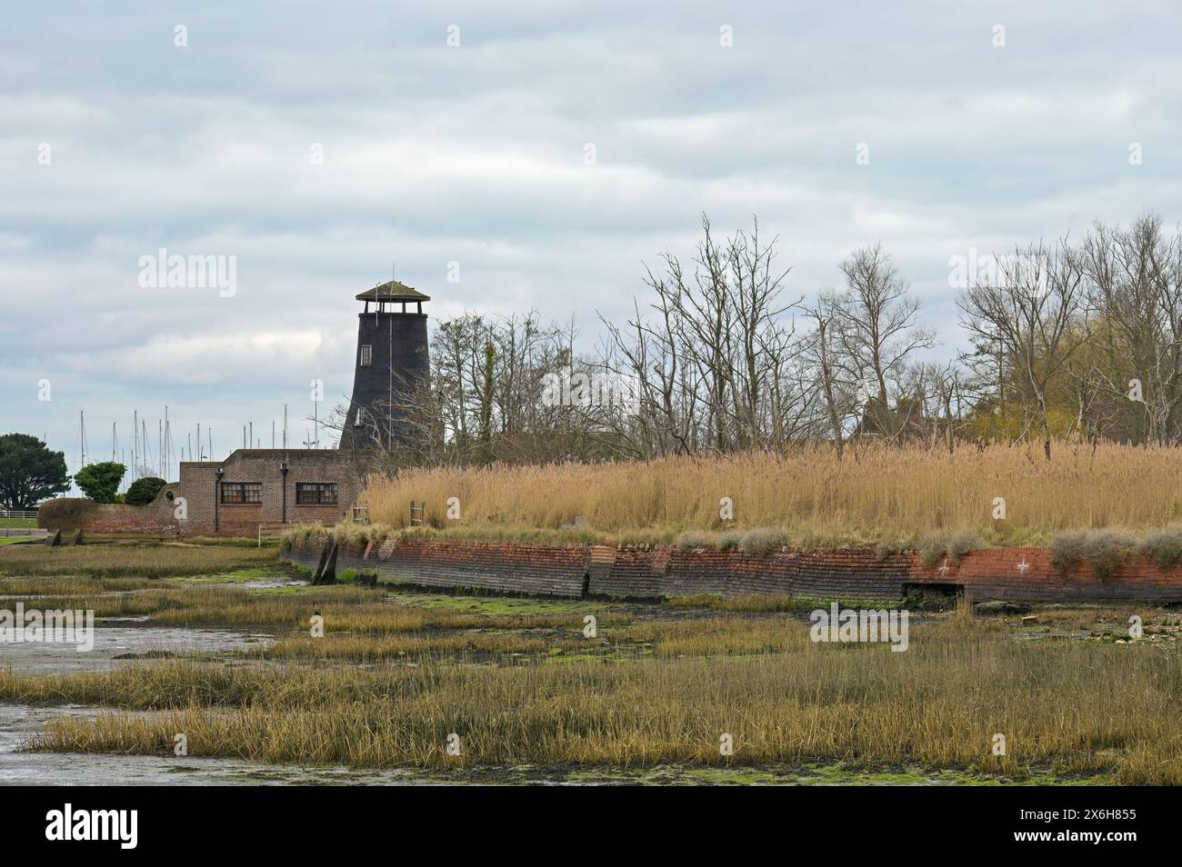 The Royal Oak public house and Langstone Mill on the shoreline at the ...