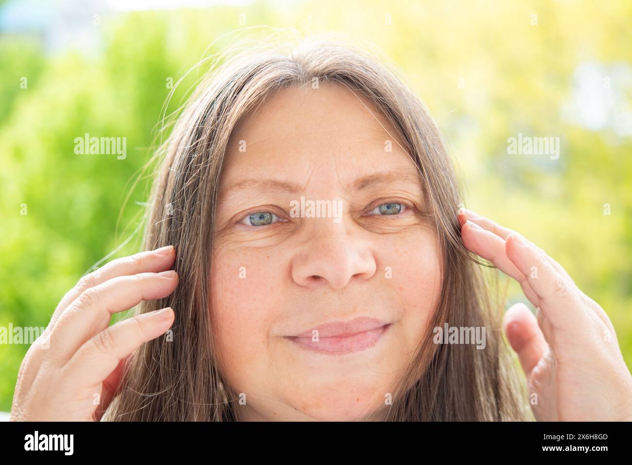 50 year old woman face hi-res stock photography and images - Alamy