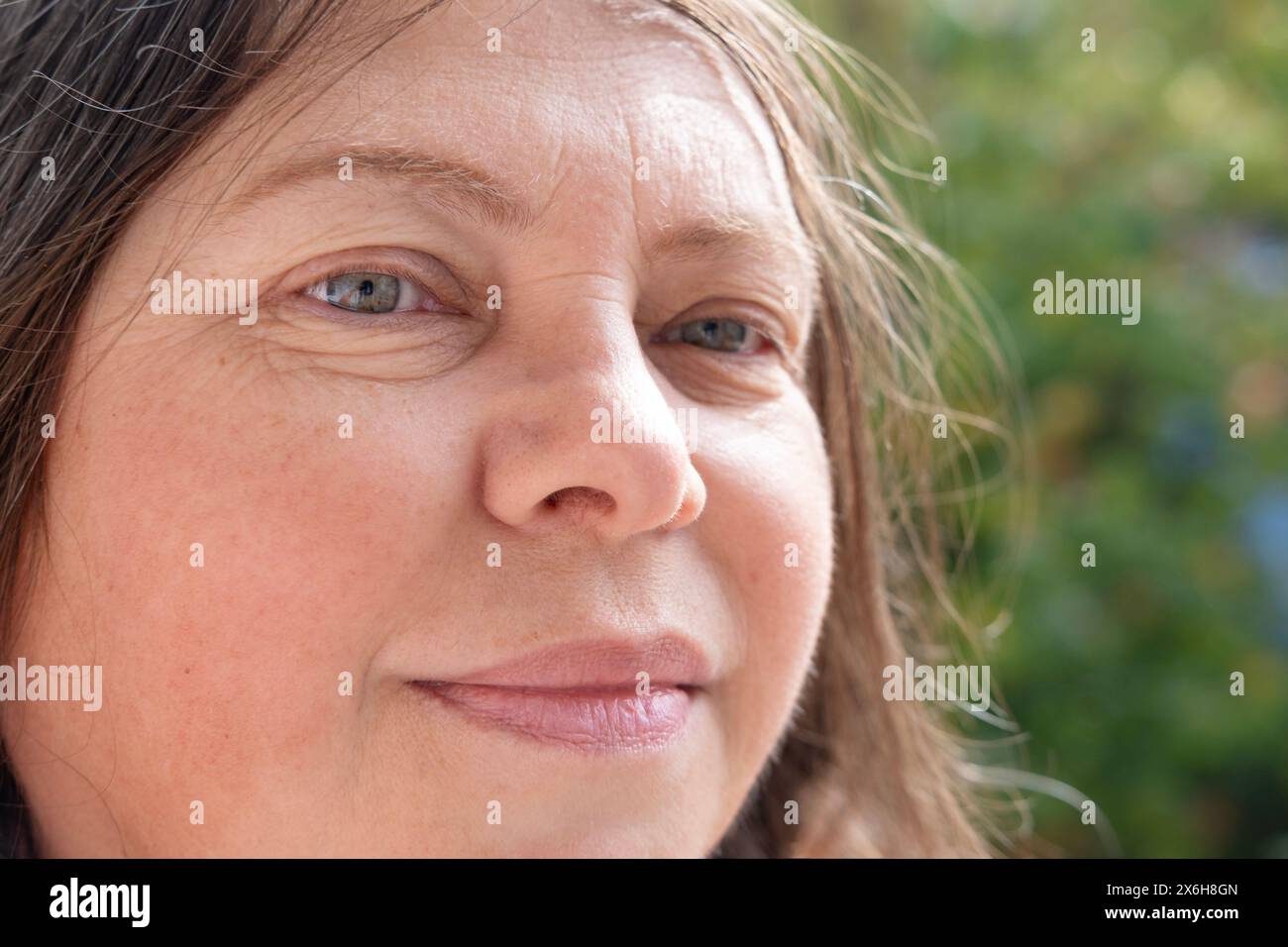 Caucasian positive 50-year-old attractive woman looking, pretty face ...