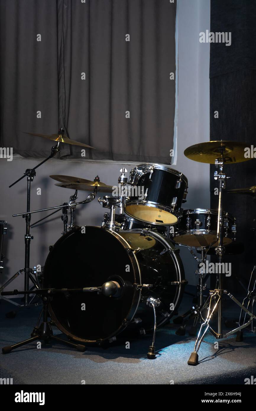 Close-up of a drum kit in a music studio. Vertical photo Stock Photo ...