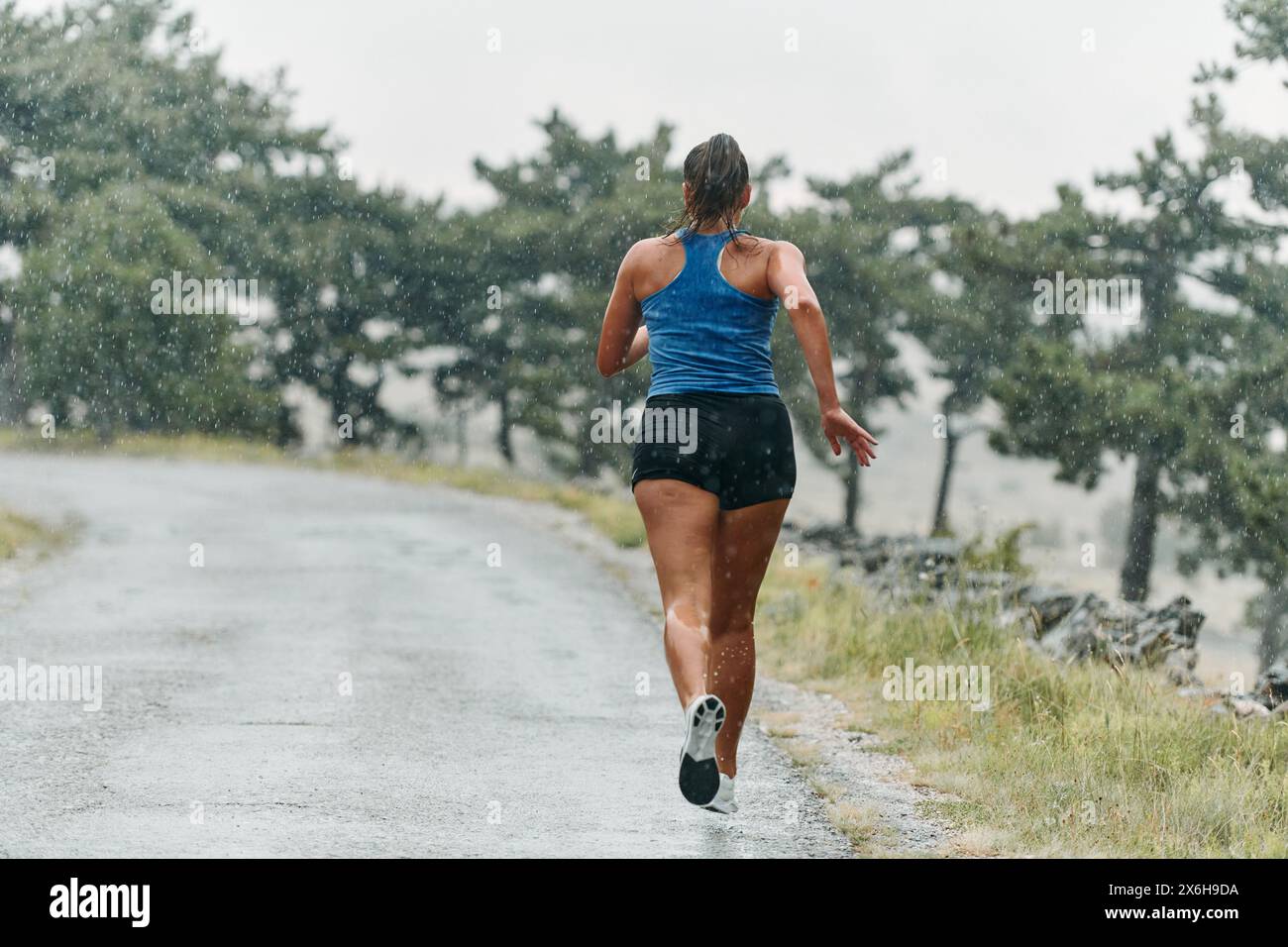 Unstoppable: A Determined Athlete Trains Through the Rain in Pursuit of ...