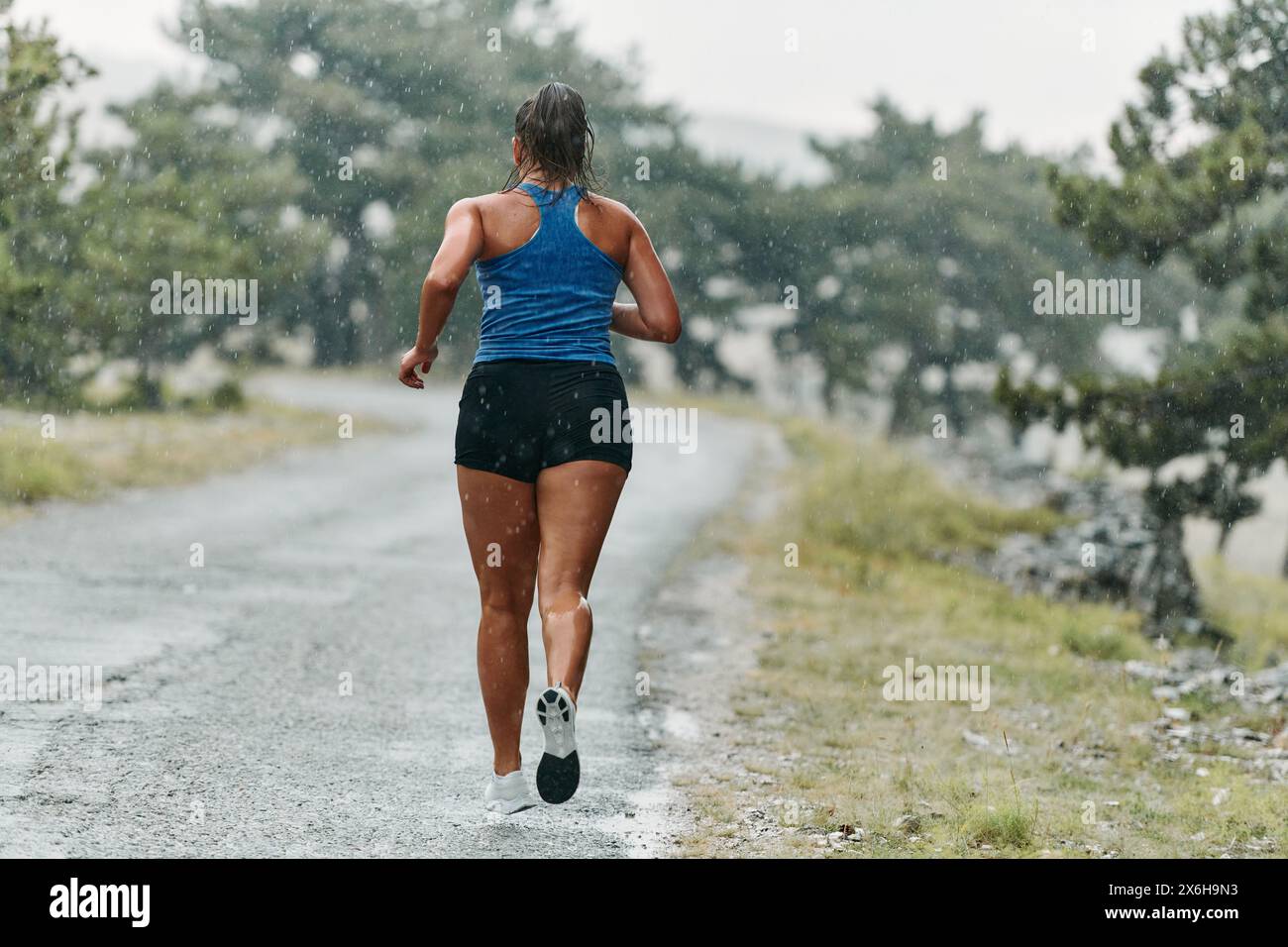Unstoppable: A Determined Athlete Trains Through the Rain in Pursuit of ...