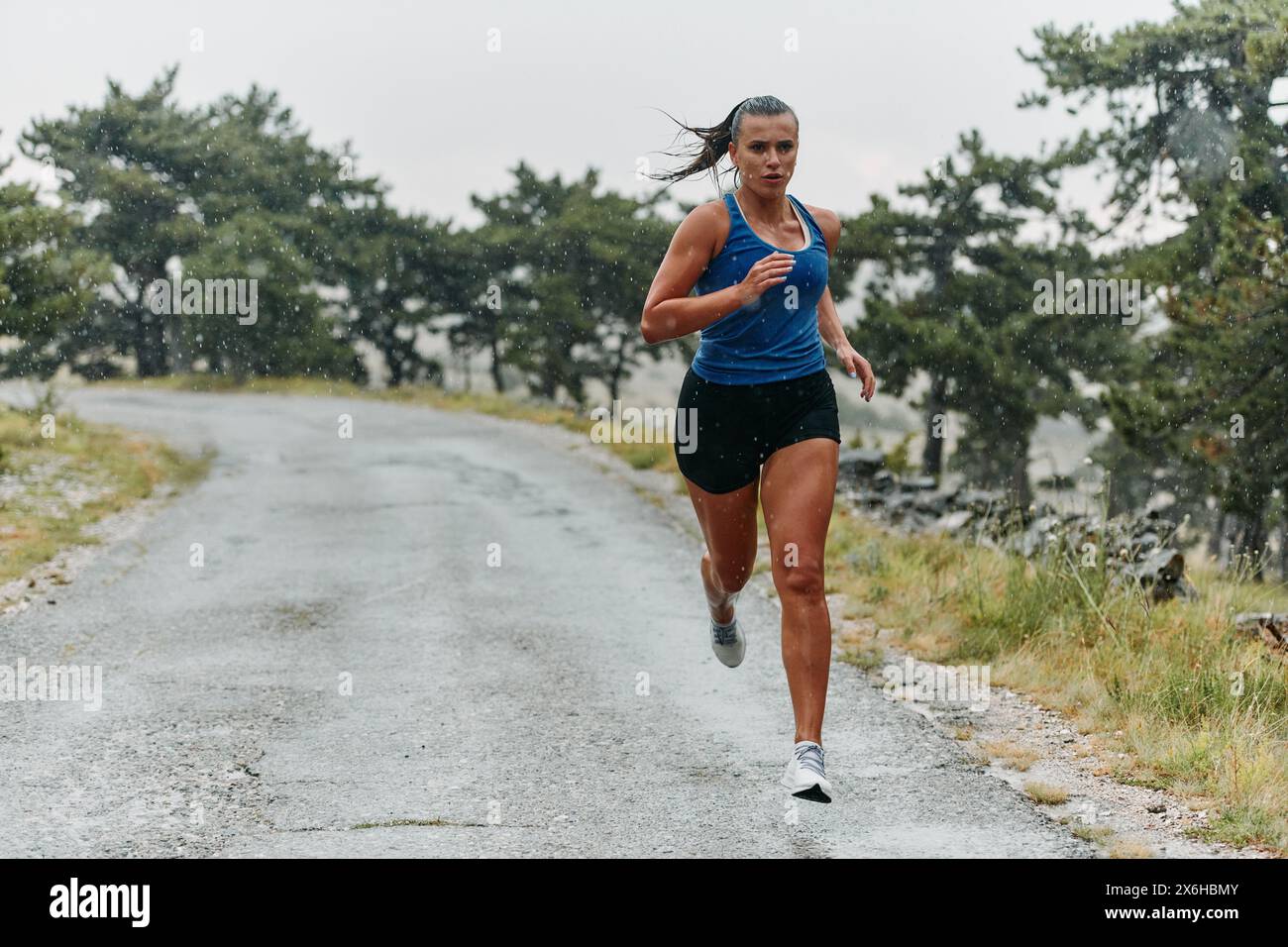 Unstoppable: A Determined Athlete Trains Through the Rain in Pursuit of ...