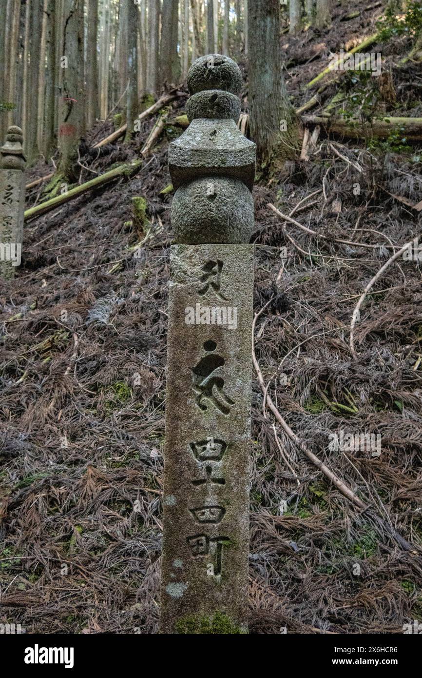 Forest jizo stone statue on the Kumano Kodo Nakahechi pilgrimage route ...