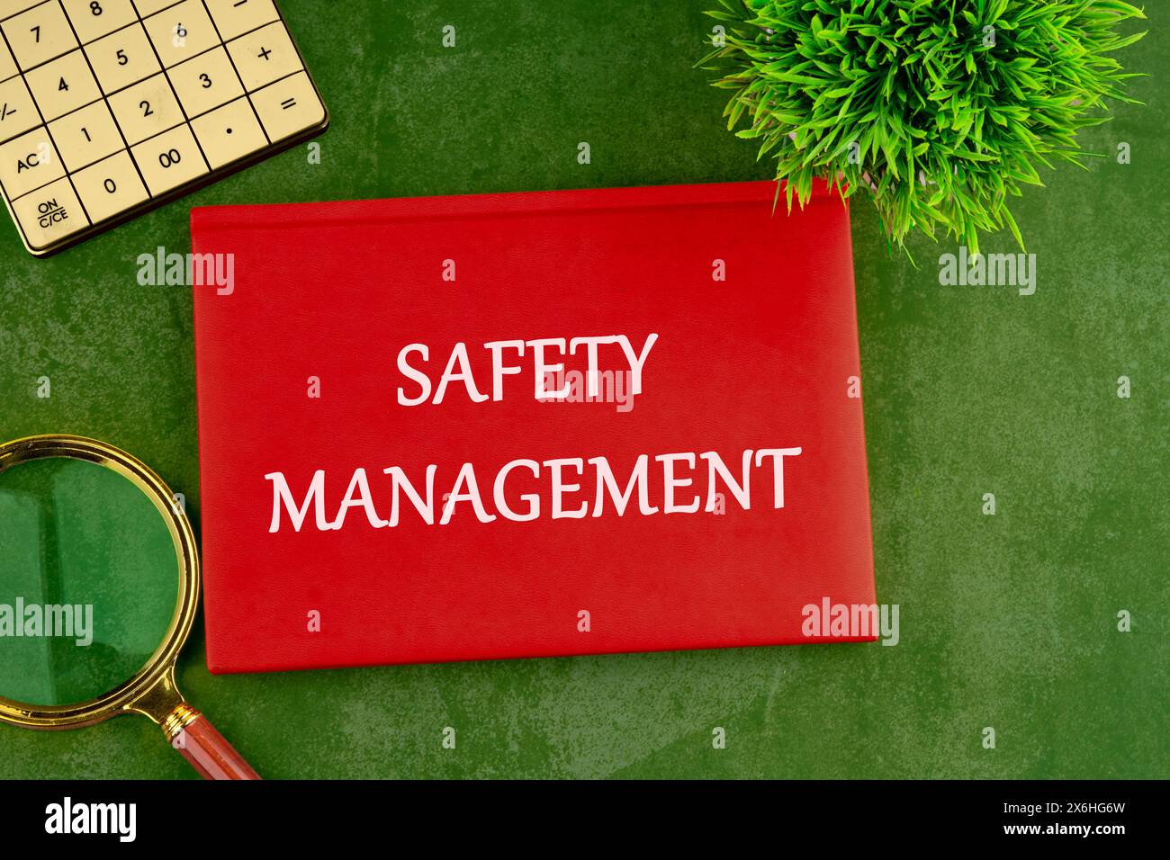 Safety Management text written on the cover of a business notebook on a ...
