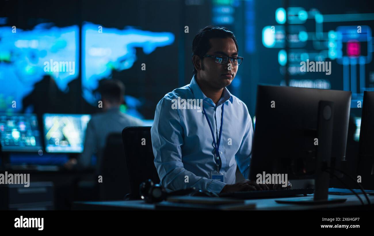 Professional IT Technical Support Specialist and Software Developer Working on Computer in ...