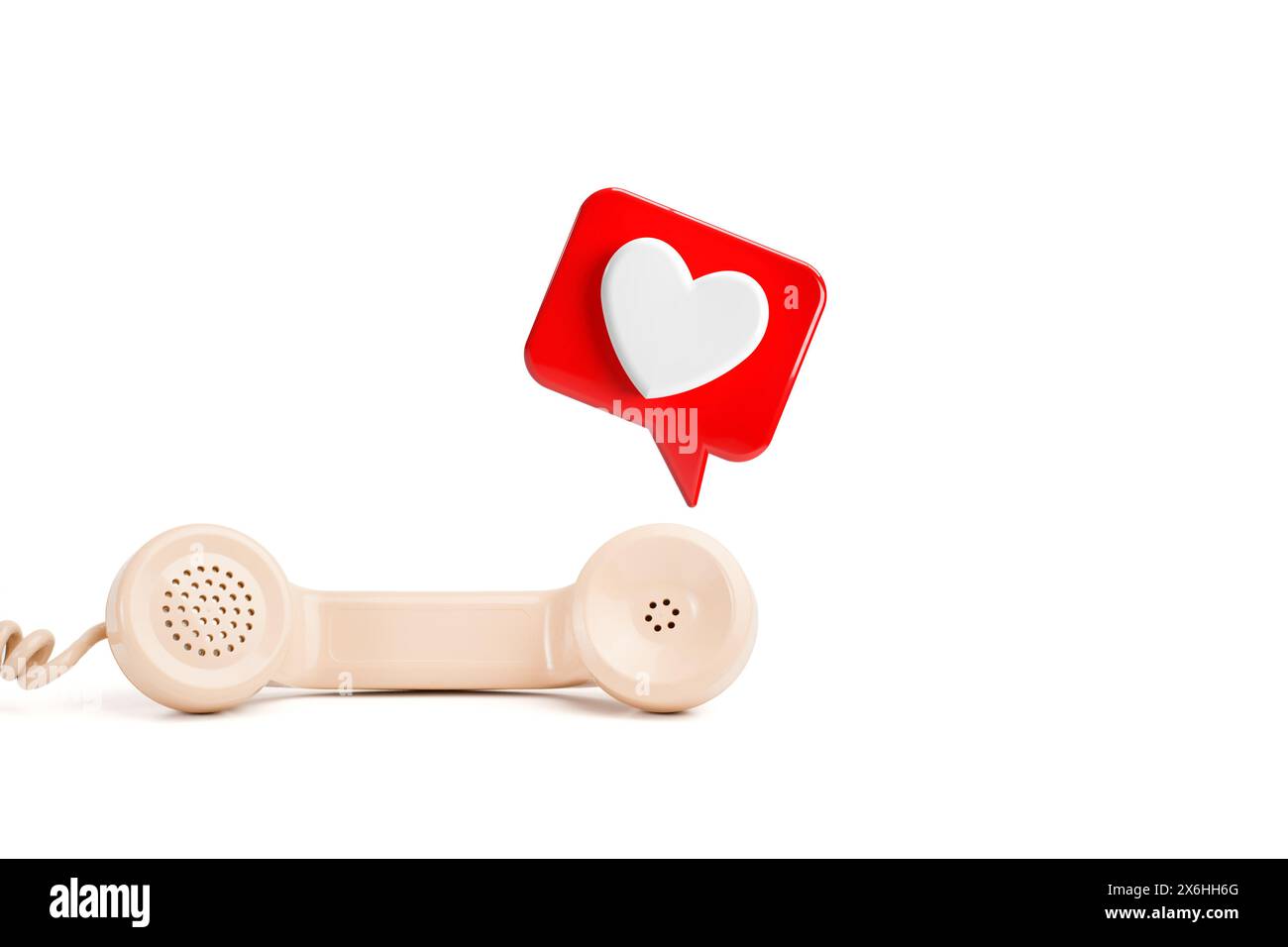 A telephone handset with a red speech bubble with a white heart inside ...