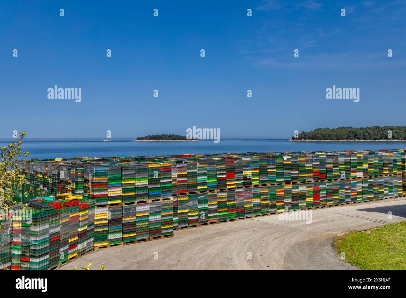 Colorful seafood crates in Croatia, ship for transporting fish and ...