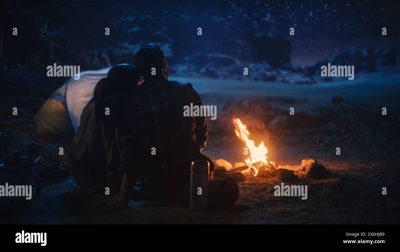 Happy Couple Camping in the Canyon, Sitting Watching Campfire and ...