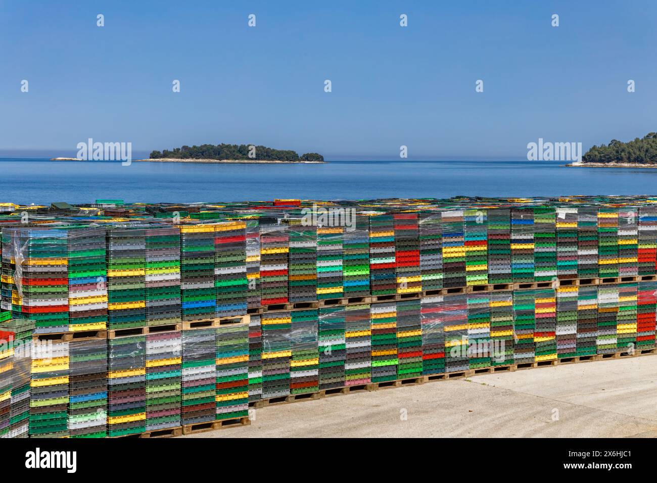 Colorful seafood crates in Croatia, ship for transporting fish and ...
