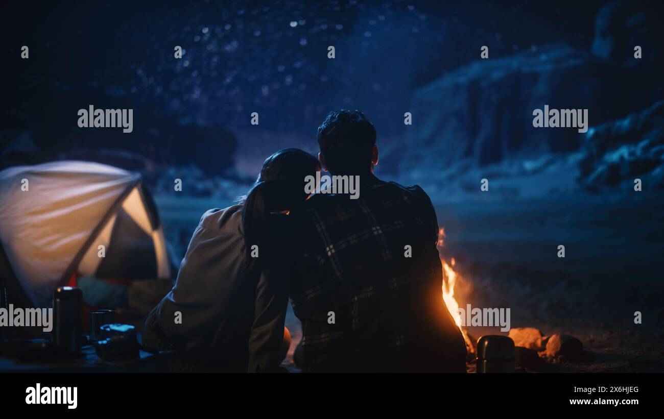 Happy Couple Camping in the Canyon, Sitting Watching Campfire and ...