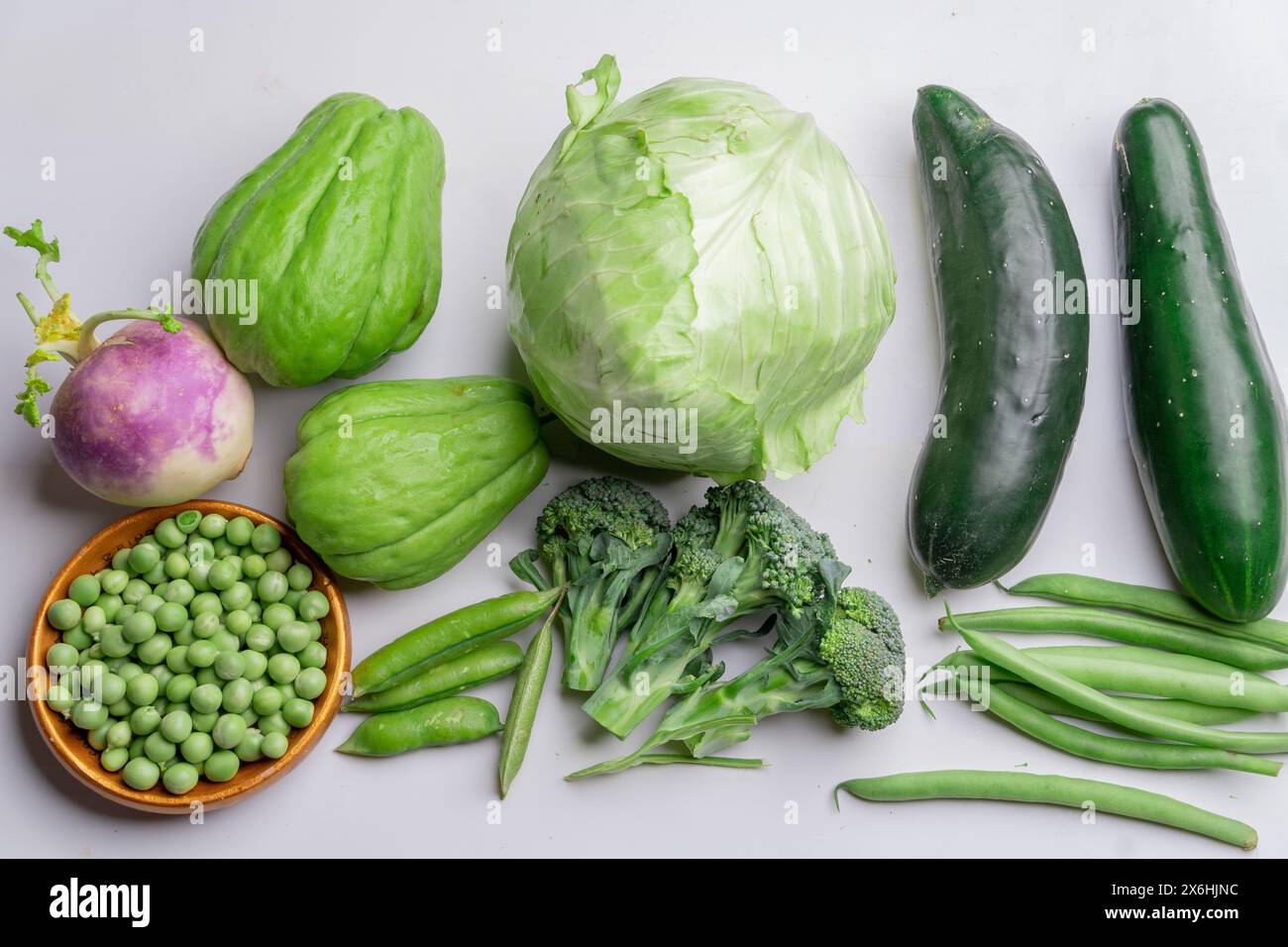 creative layout of healthy vegetables composed of lettuce, cucumbers ...