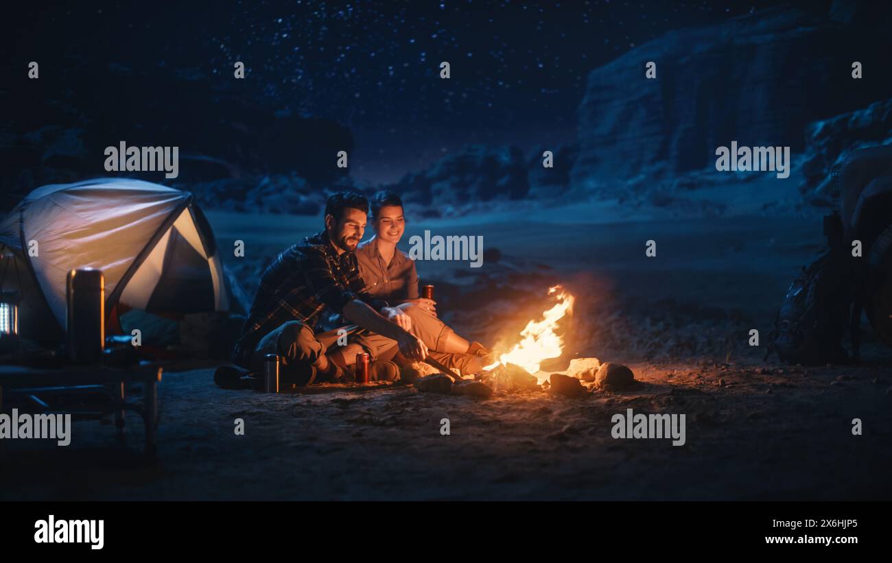 Happy Couple Nature Camping in the Canyon, Sitting Watching Campfire ...