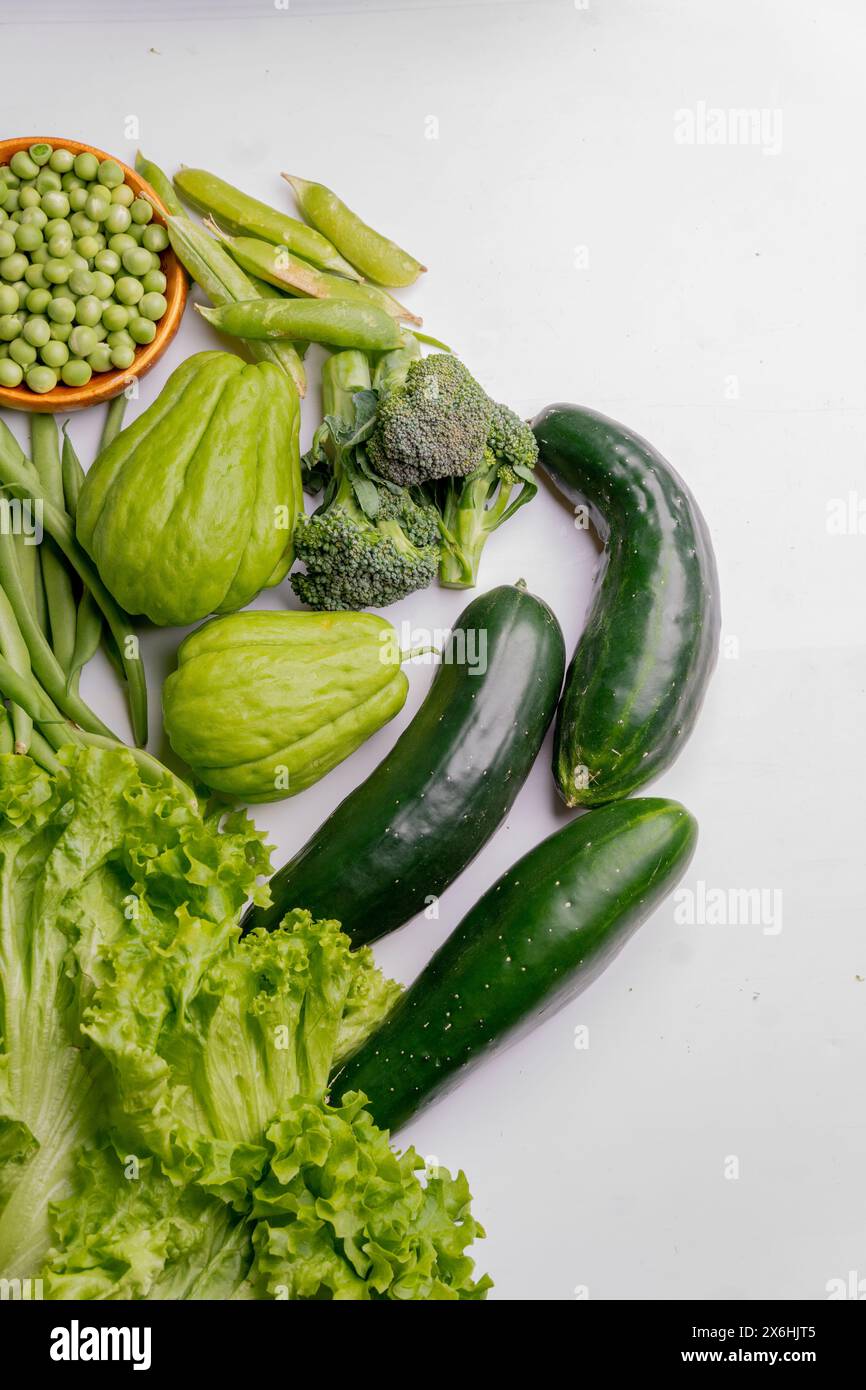 creative layout of healthy vegetables composed of lettuce, cucumbers ...