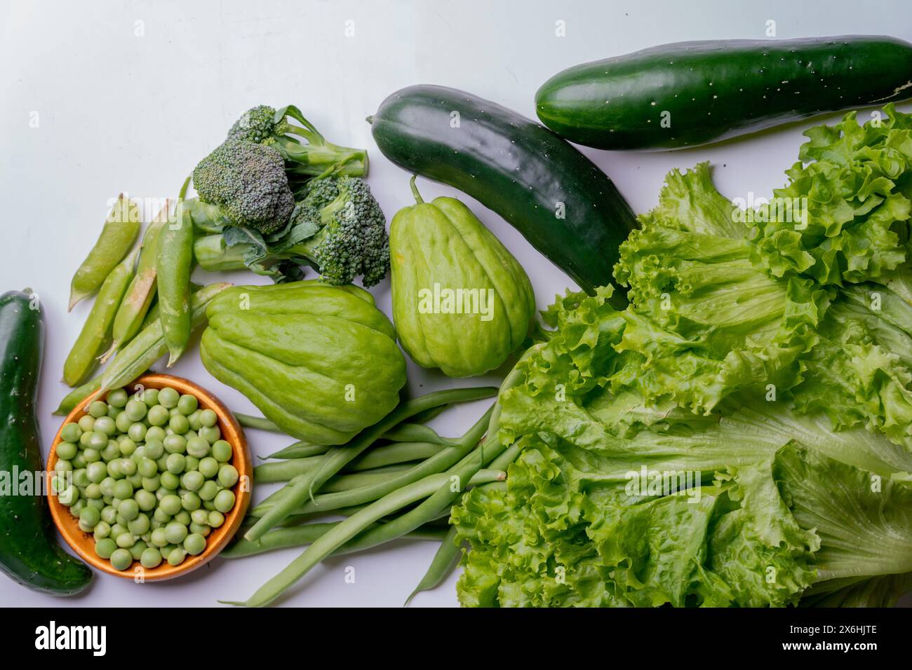 creative layout of healthy vegetables composed of lettuce, cucumbers ...